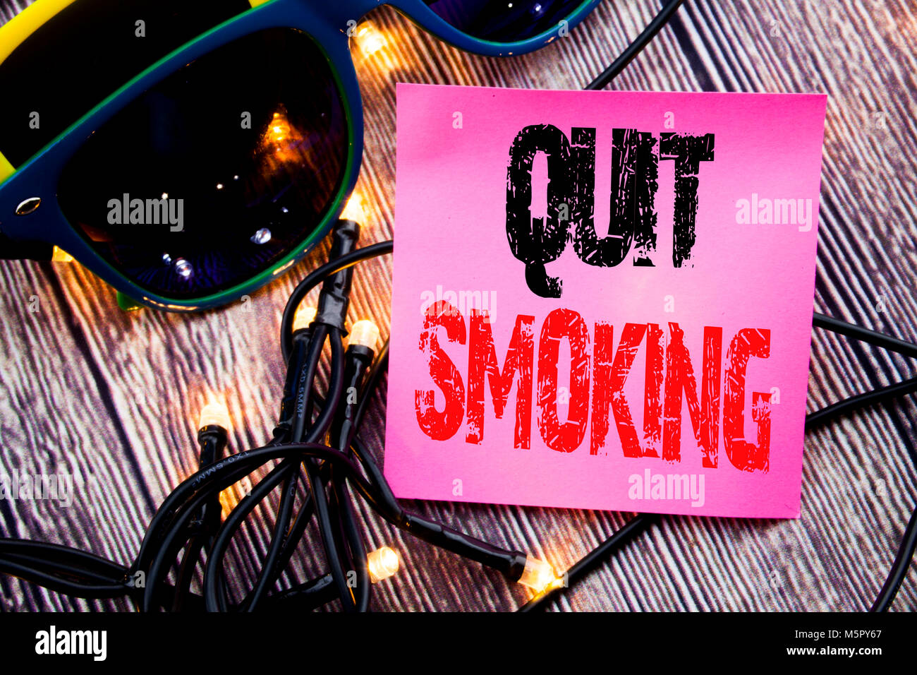 Hand writing text caption showing Quit Smoking. Business concept for ...