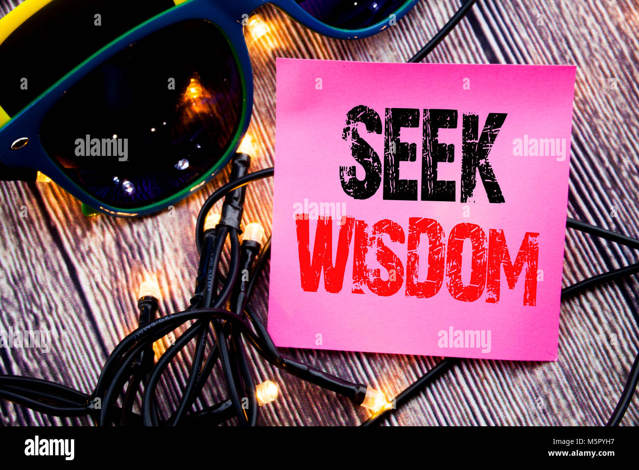Hand writing text caption showing Seek Wisdom. Business concept for ...