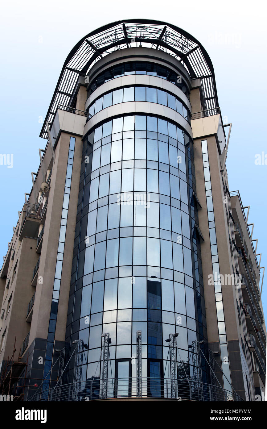 Tall modern business building with glass wall facade Stock Photo - Alamy