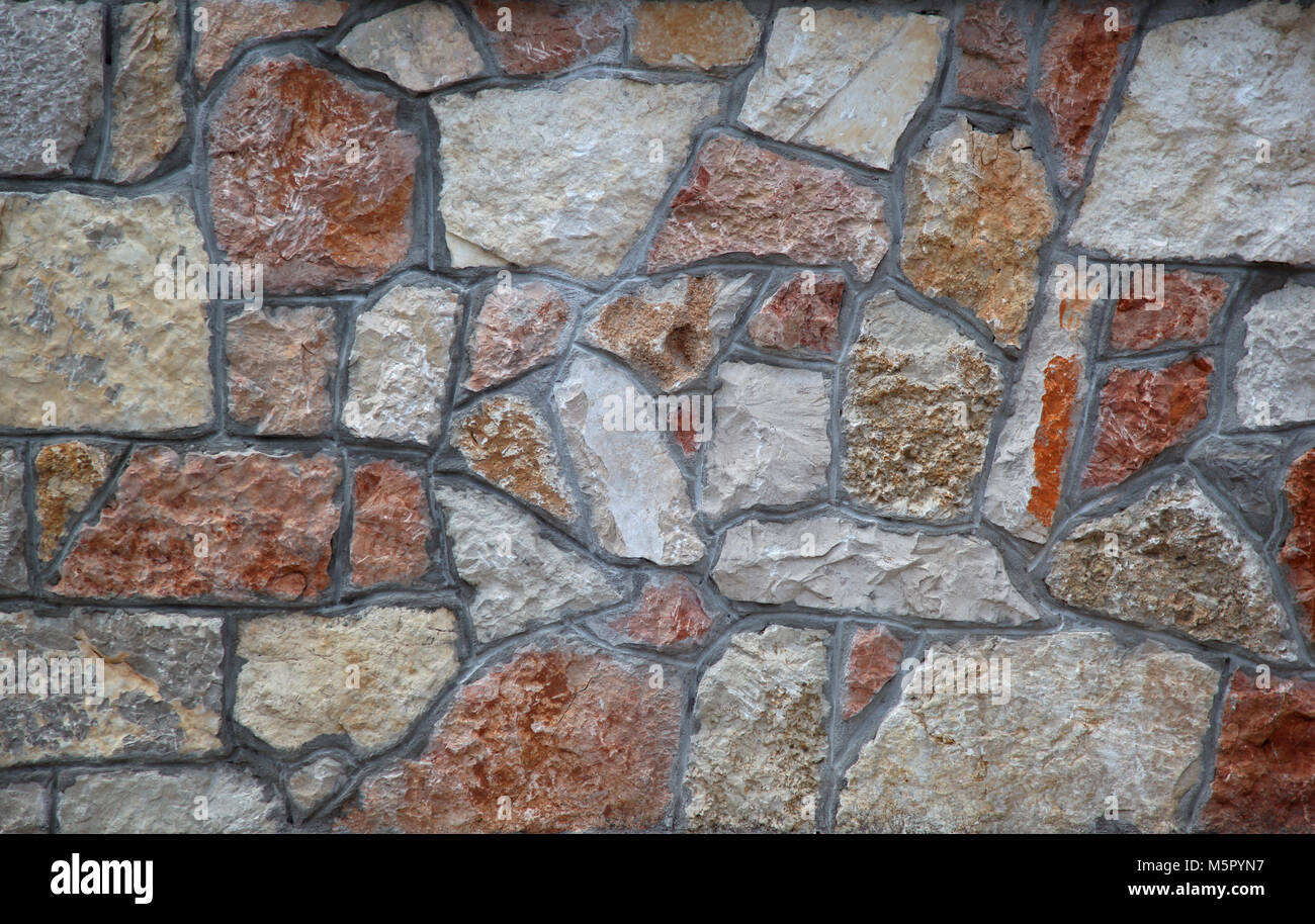 Detailed beige stone texture on outside wall Stock Photo - Alamy