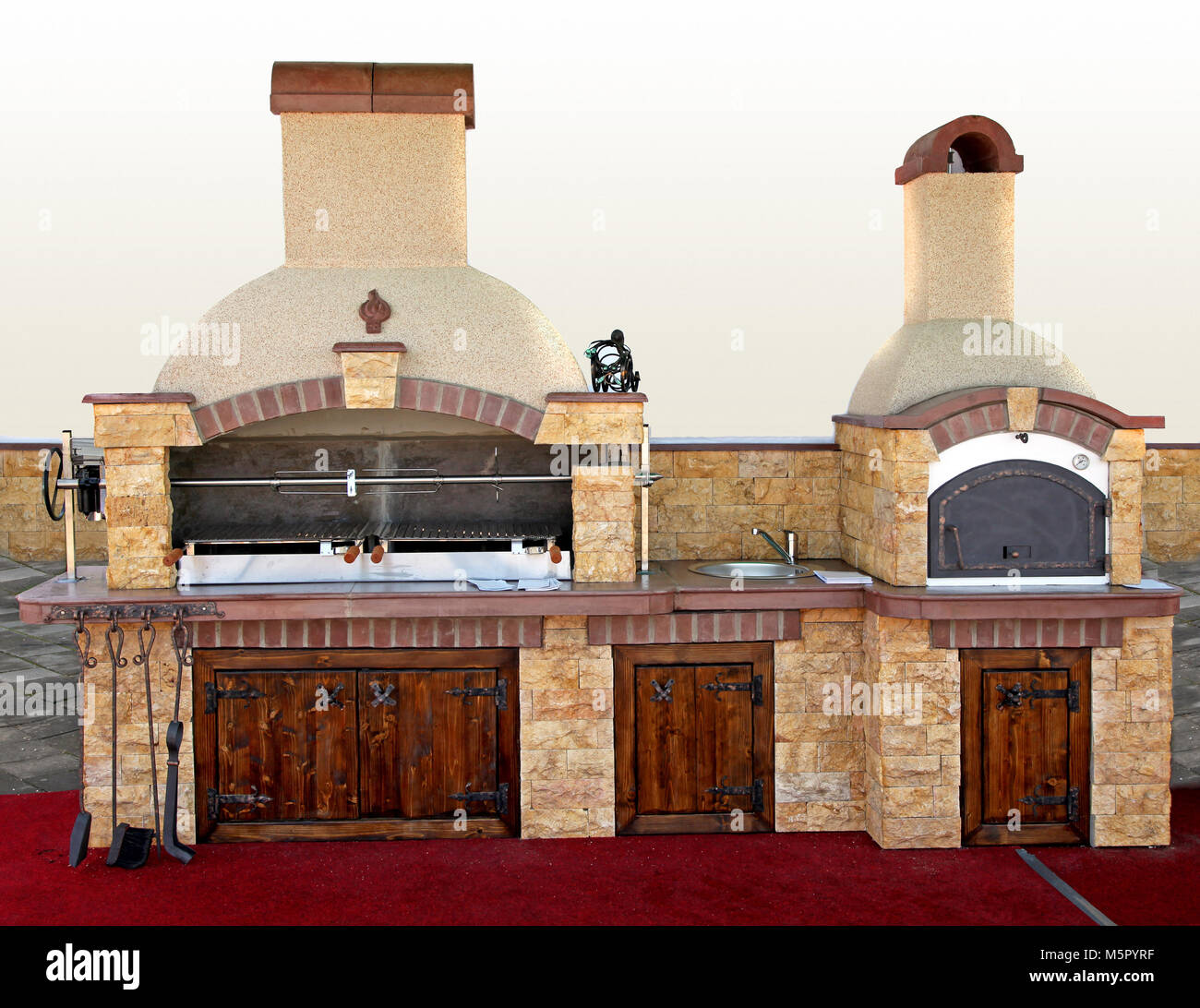 Large retro barbecue built in stone outside Stock Photo - Alamy