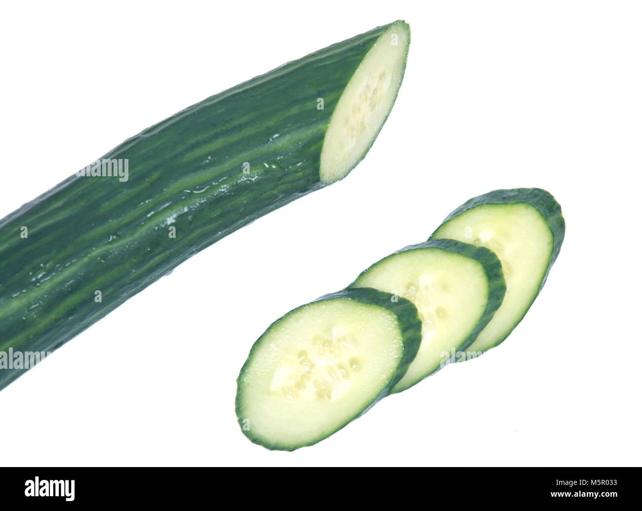 Long fresh english cucumber from greenhouse isolated on white ...