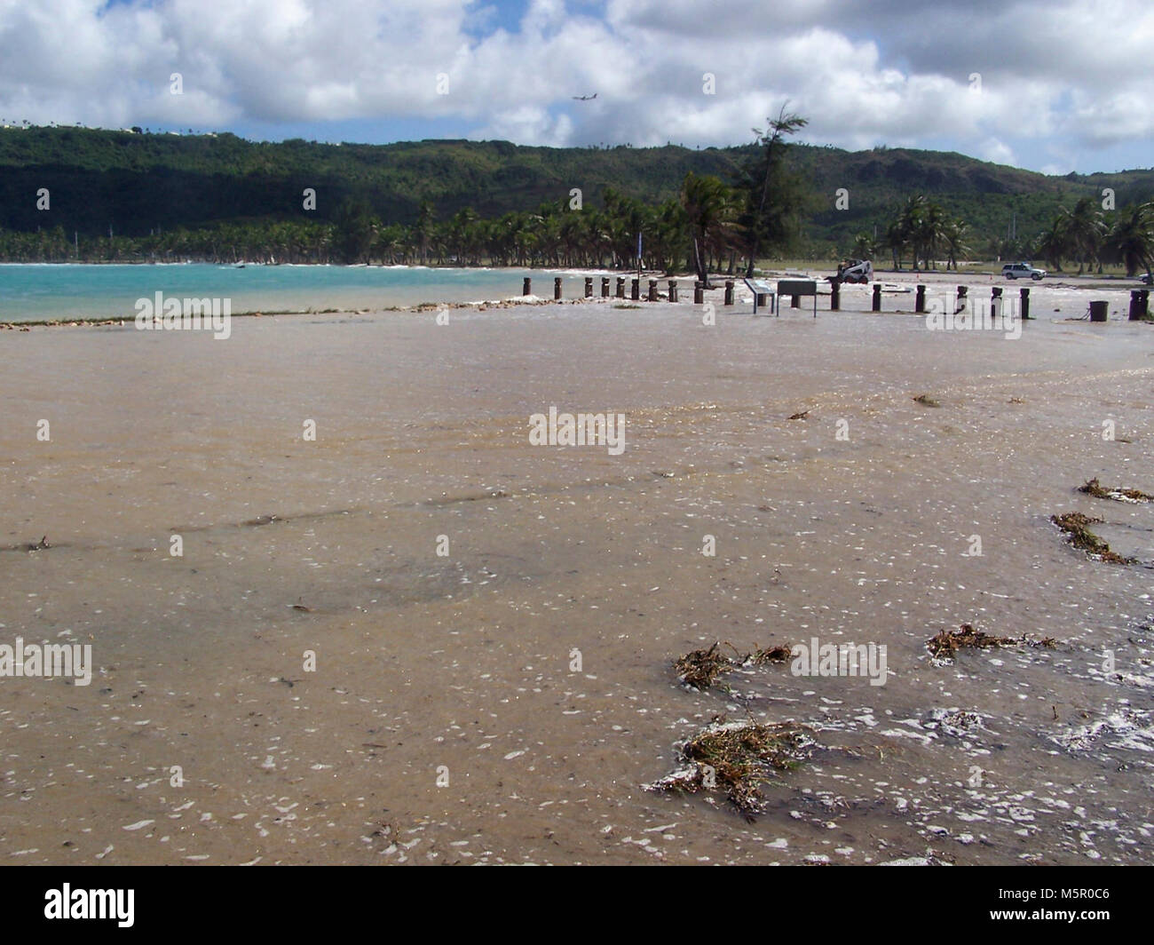 Asan Beach flooding . Damage in 2009 from coastal flooding at Asan ...