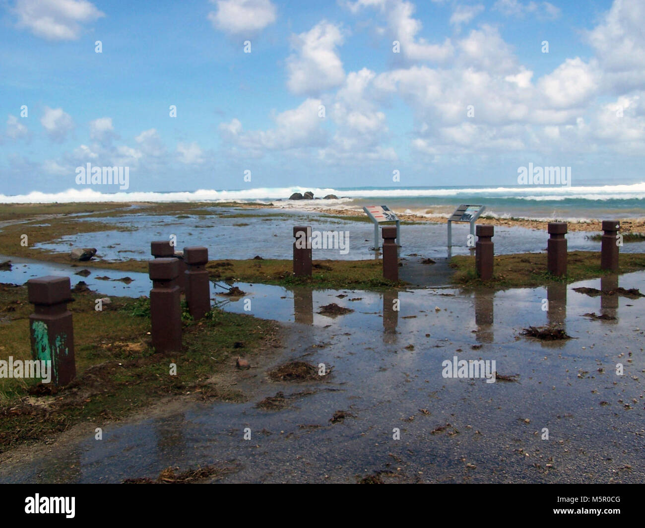 Asan Beach flooding . Damage in 2009 from coastal flooding at Asan ...