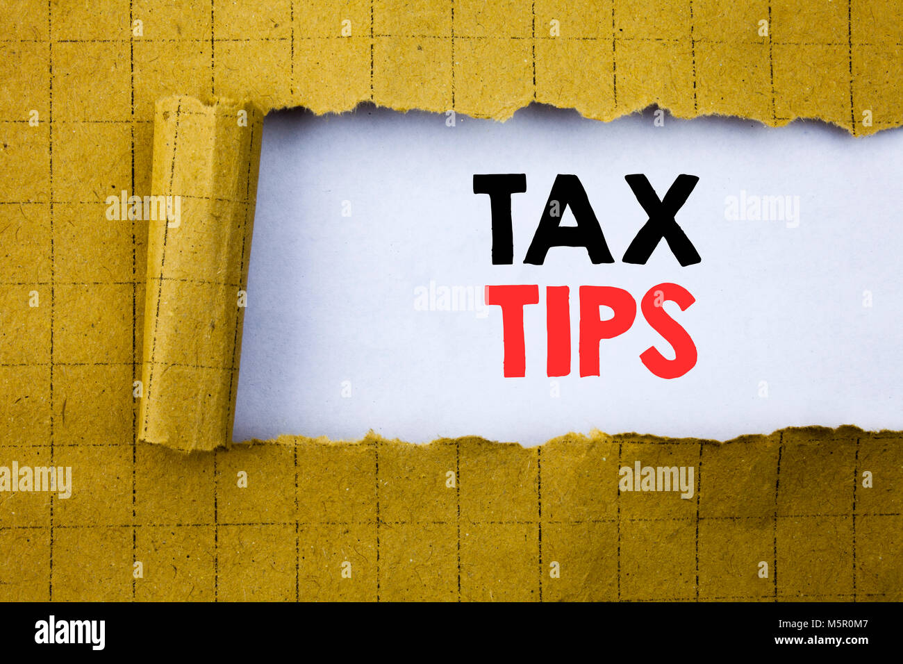 Tax Tips. Business concept for Tip Forn Taxes written on white paper on ...
