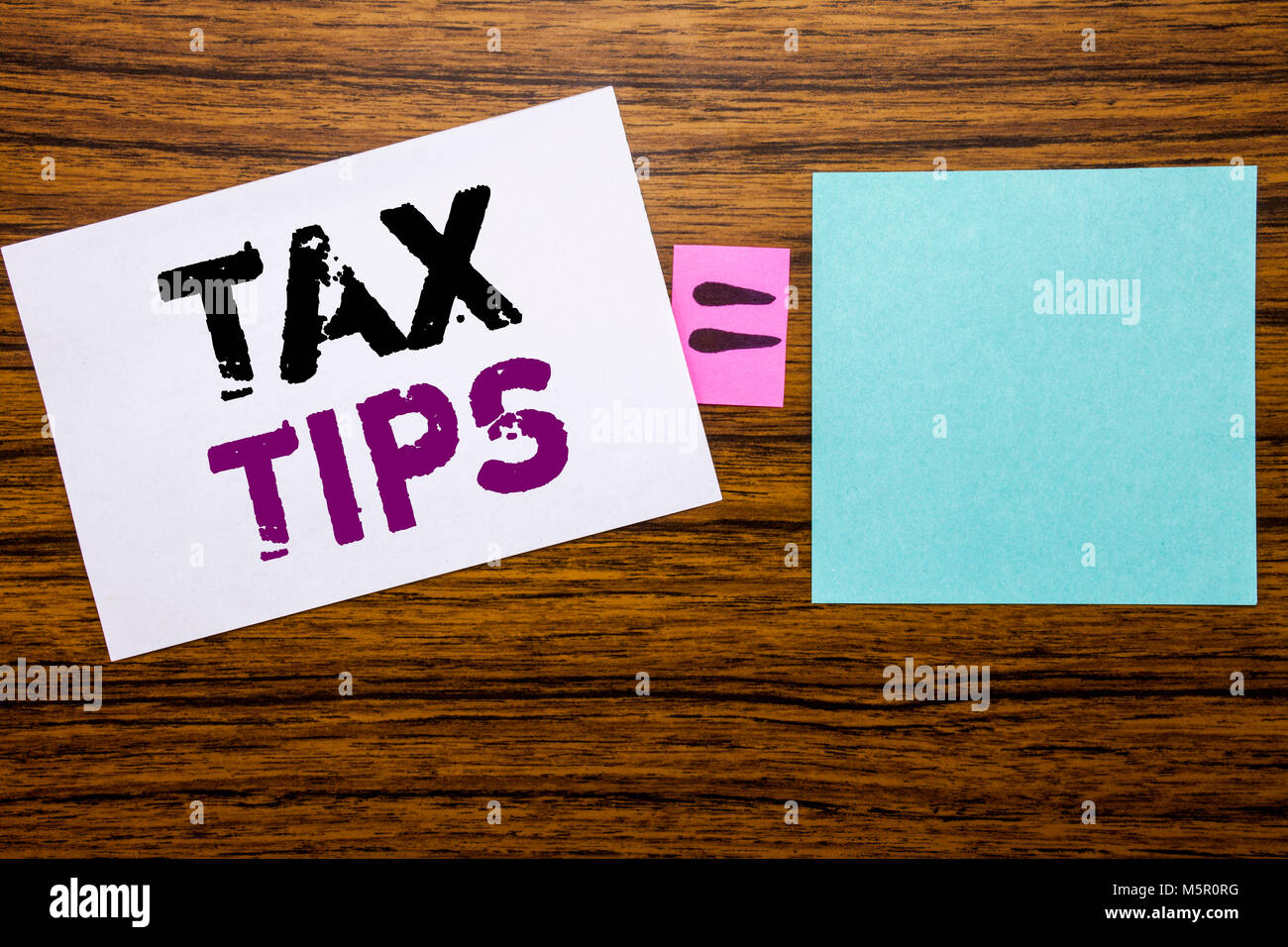Handwriting Announcement text showing Tax Tips. Business concept for ...