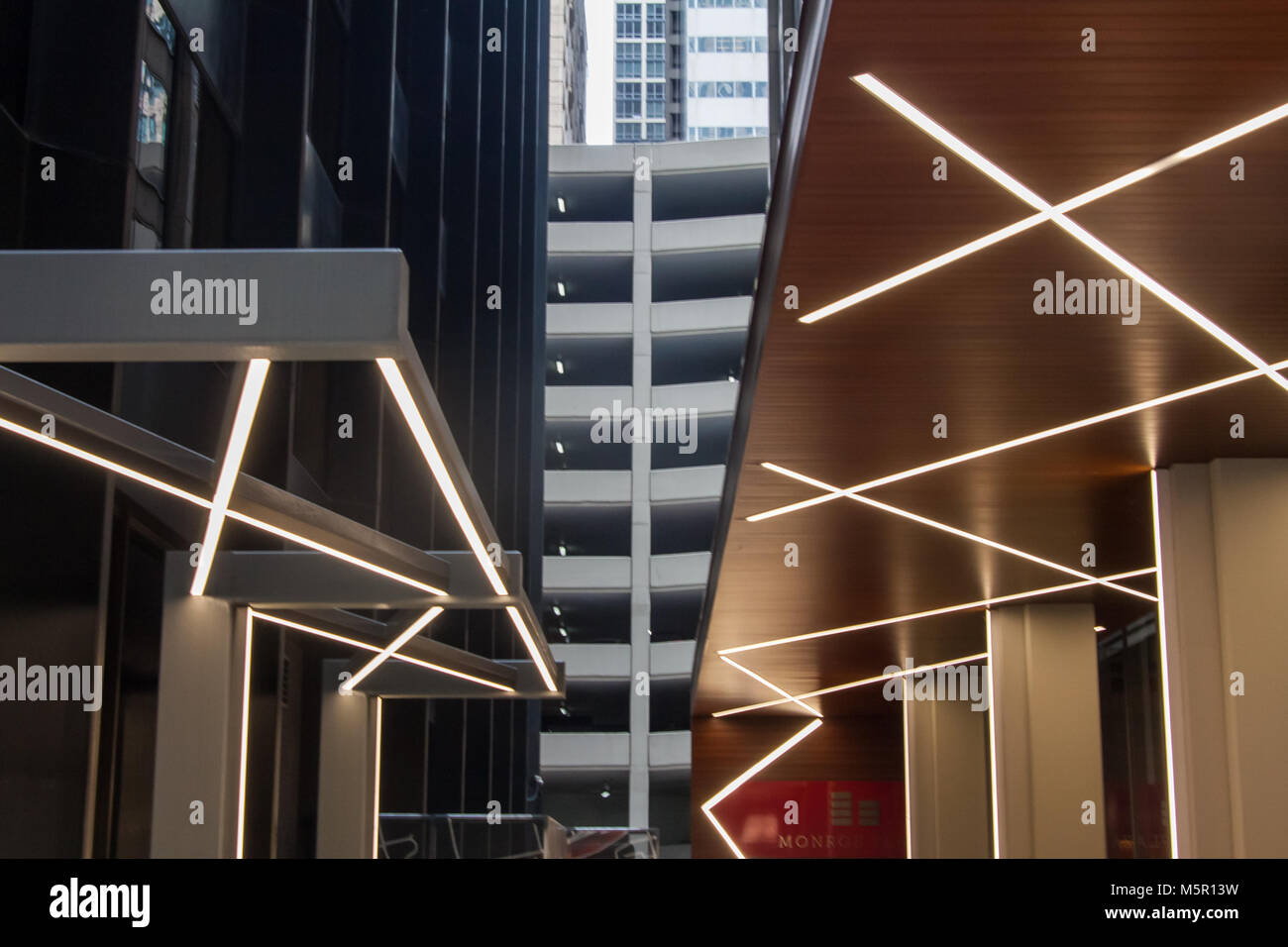 Cool lighting between buildings Stock Photo - Alamy