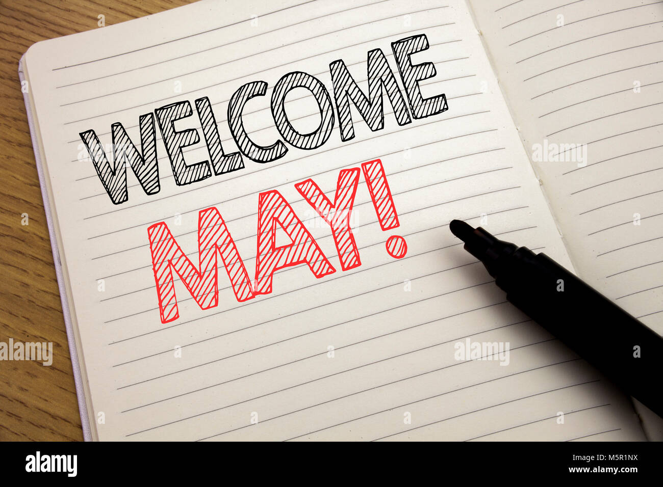 Handwriting Announcement text showing Welcome May. Business concept for ...