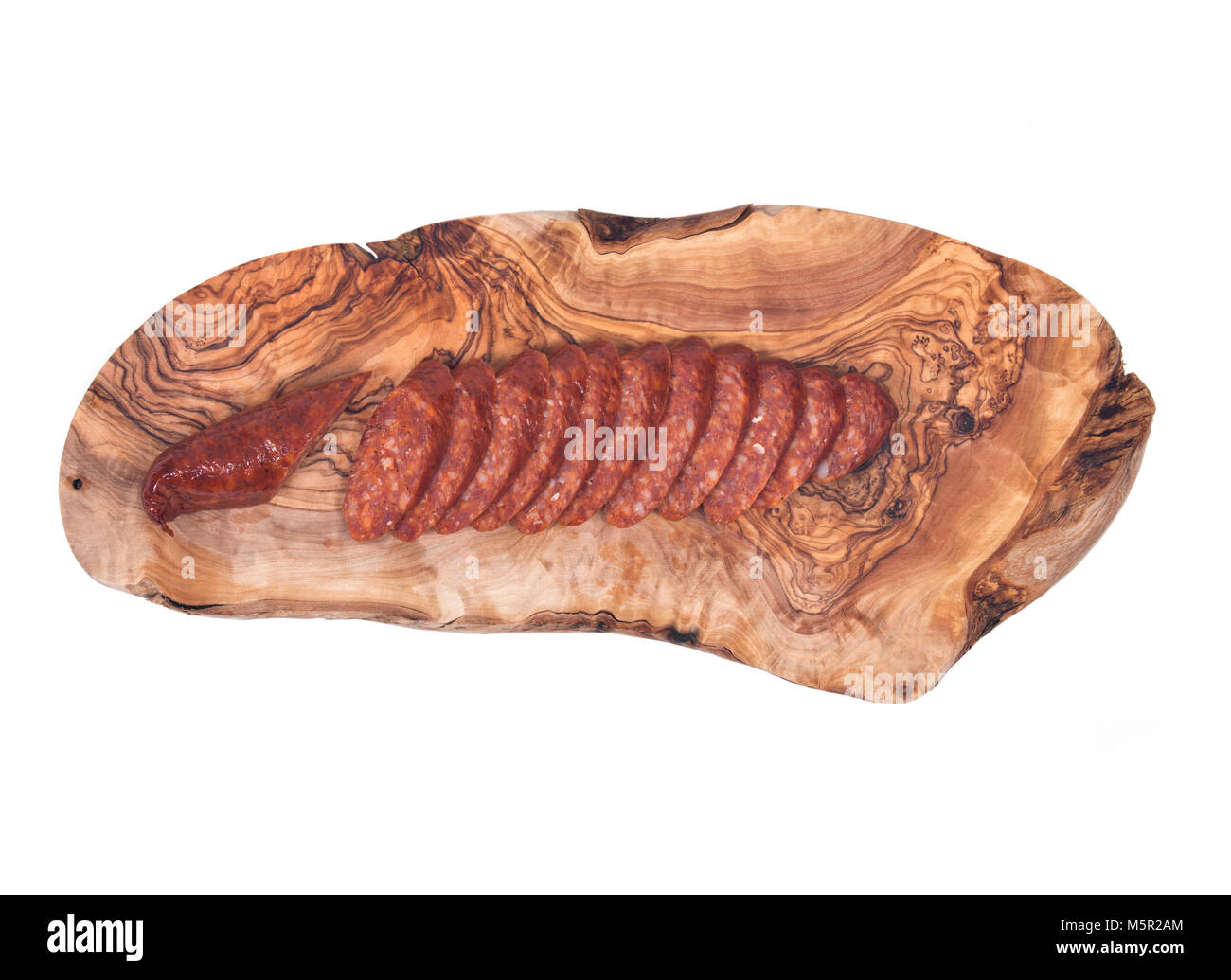 Guylai kolbasz, hungarian smoked sausage on natural olive wood cutting ...