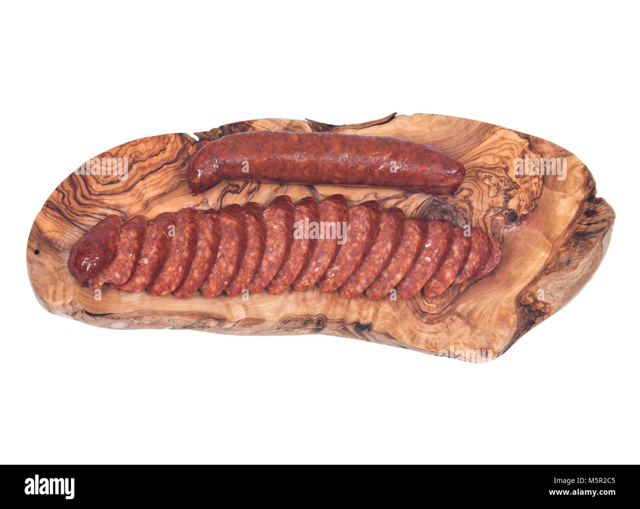 Guylai kolbasz, hungarian smoked sausage on natural olive wood cutting ...