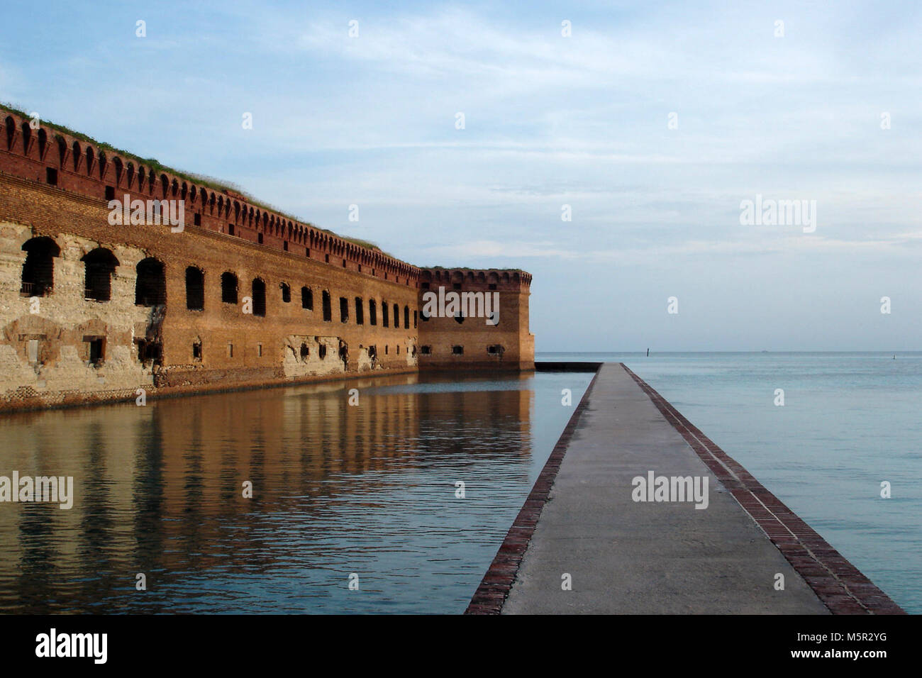 Fort Jefferson moat and wall . The Gulf of Mexico laps against the moat ...