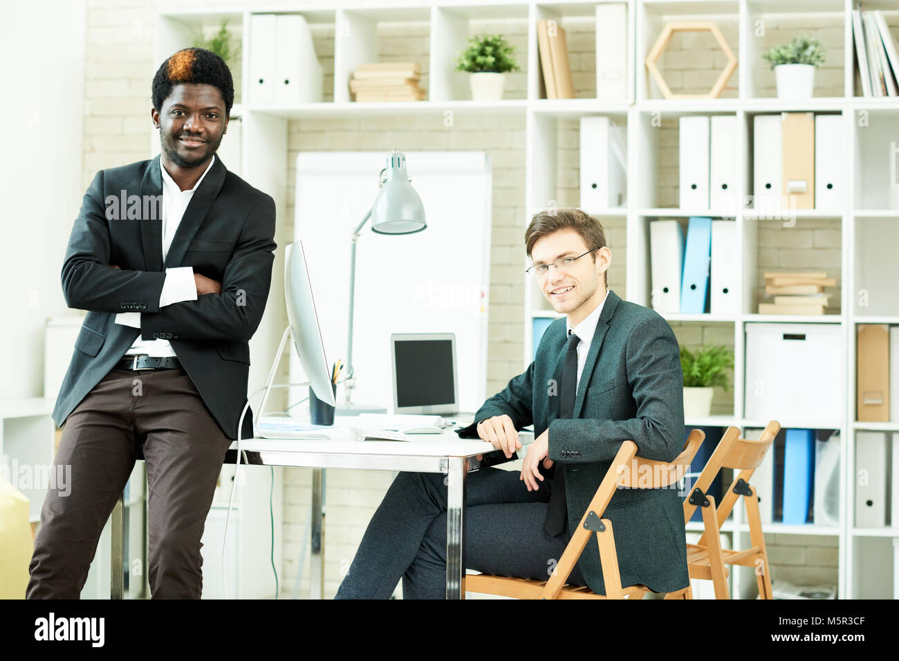 Managers wearing suits hi-res stock photography and images - Alamy