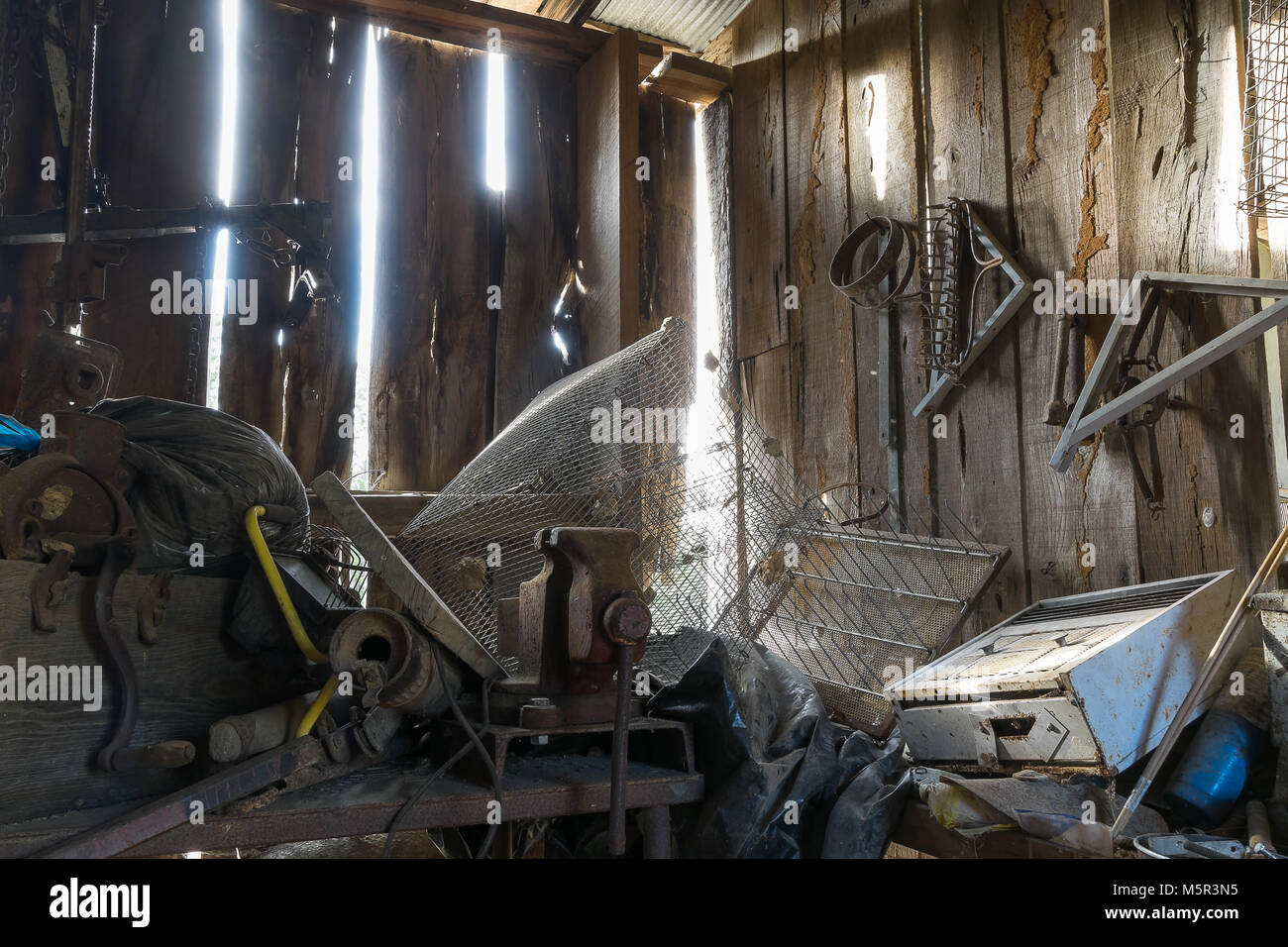 An old, rickety, storage building with separations in the wall that ...
