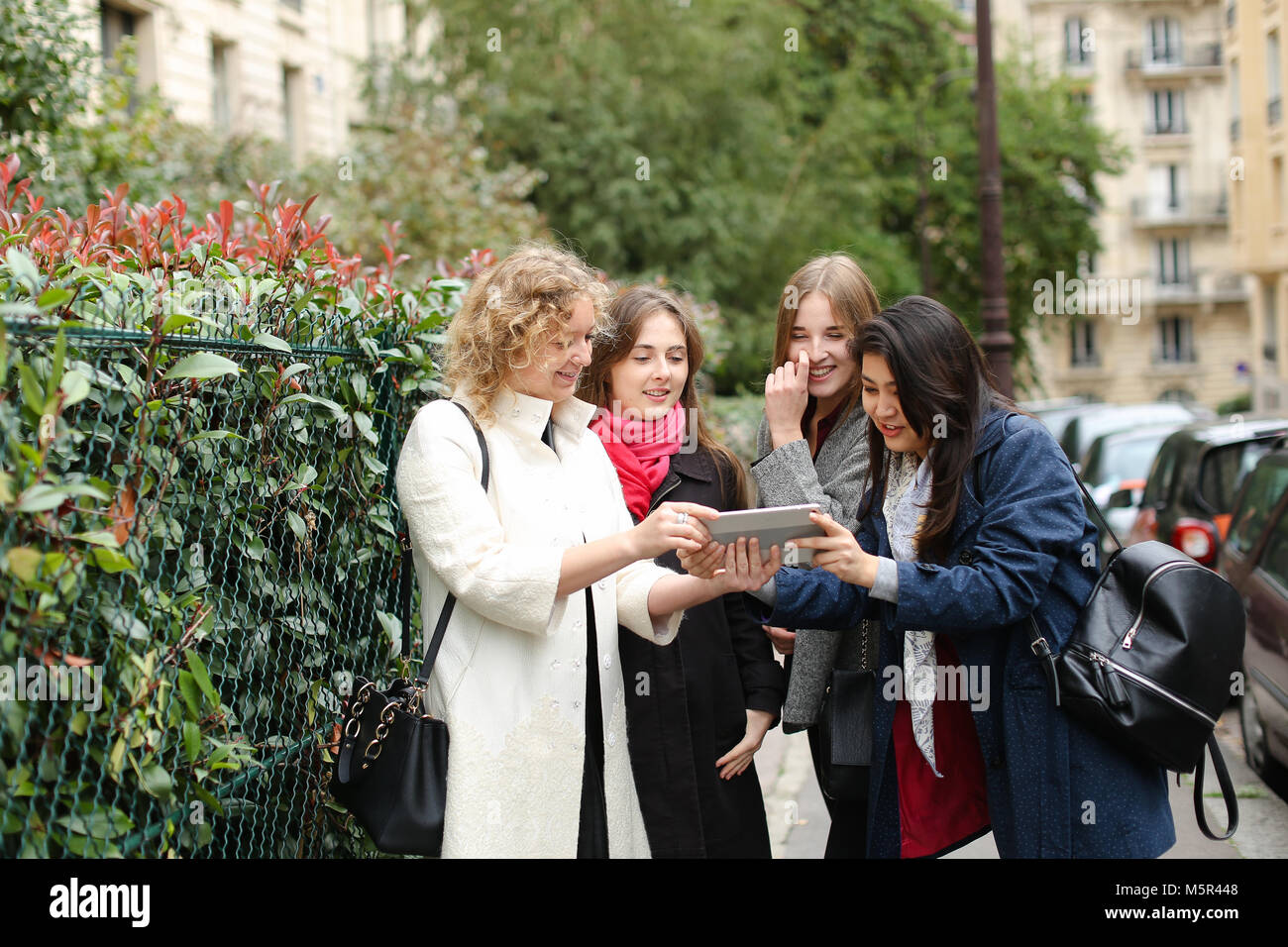 International students talking with teacher outdoors in Stock Photo - Alamy