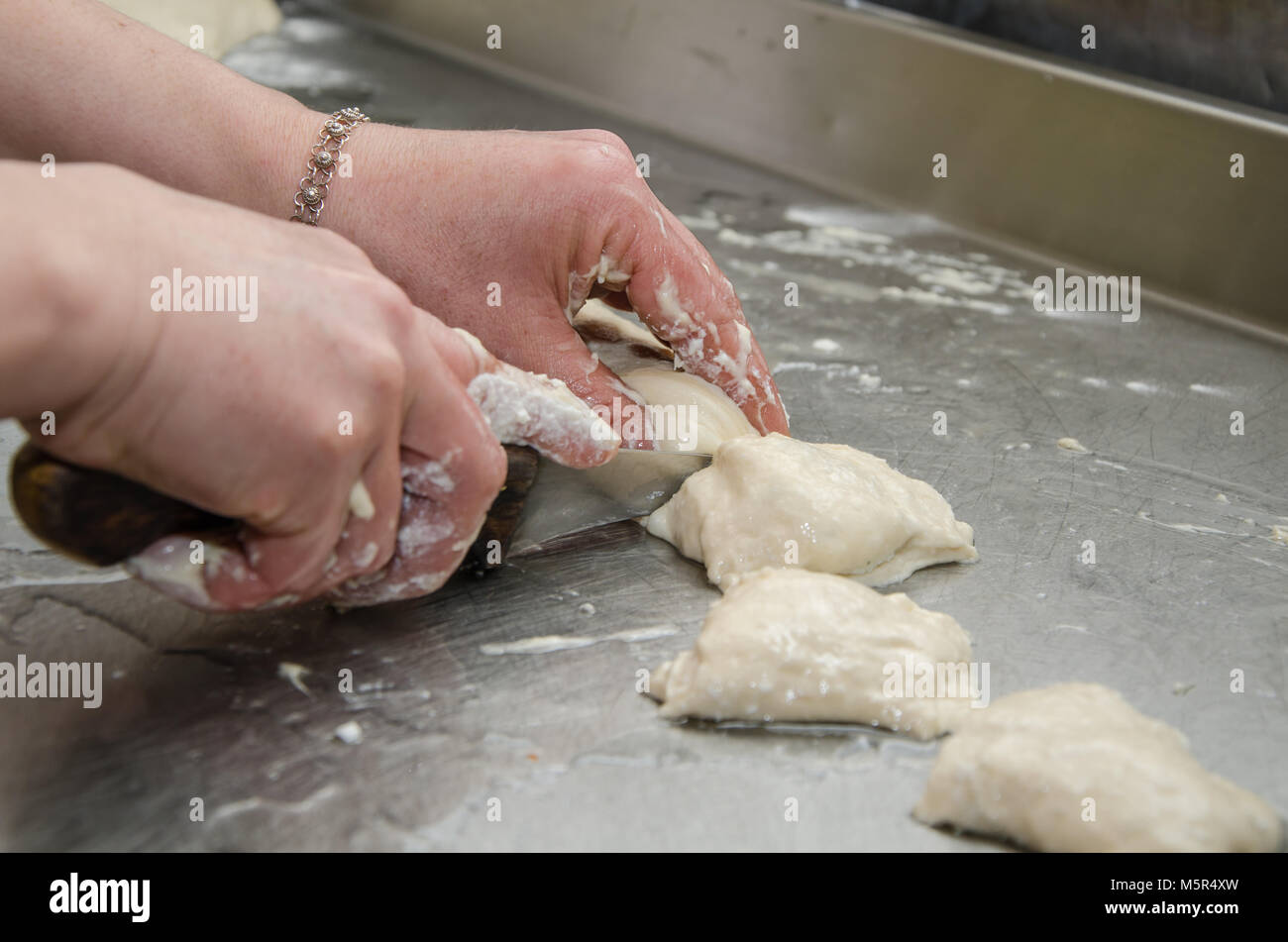 Women are making pies on the kitchen counter. women hands Stock Photo ...