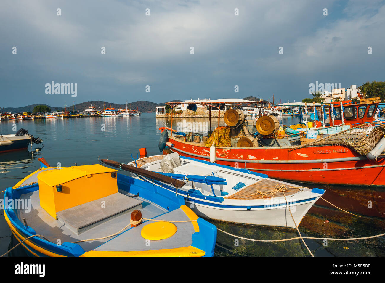 Elounda, Crete, June 07, 2017: Ships and fishing boats in the harobor ...