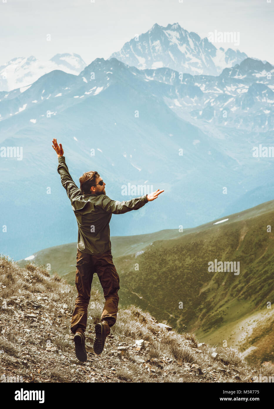 Young man flying levitation jumping hi-res stock photography and images ...