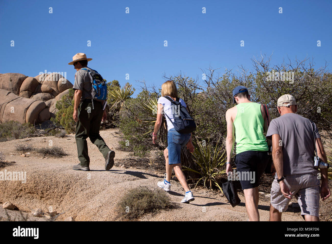 Ranger Leads Group of Visitors on an Interpretive Hike Stock Photo - Alamy