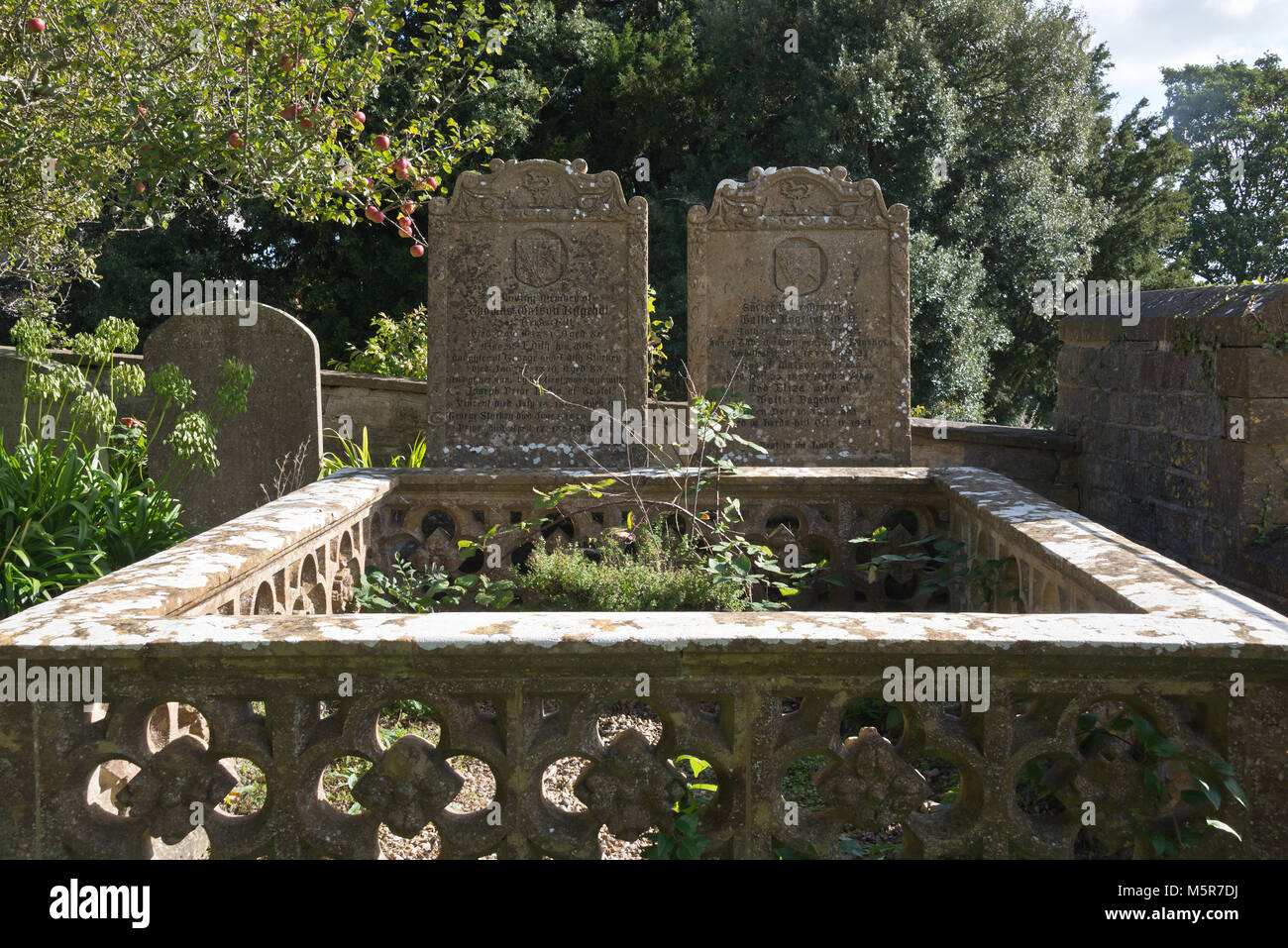 Graves and headstones in the graveyard of All Saints Church in Langport ...