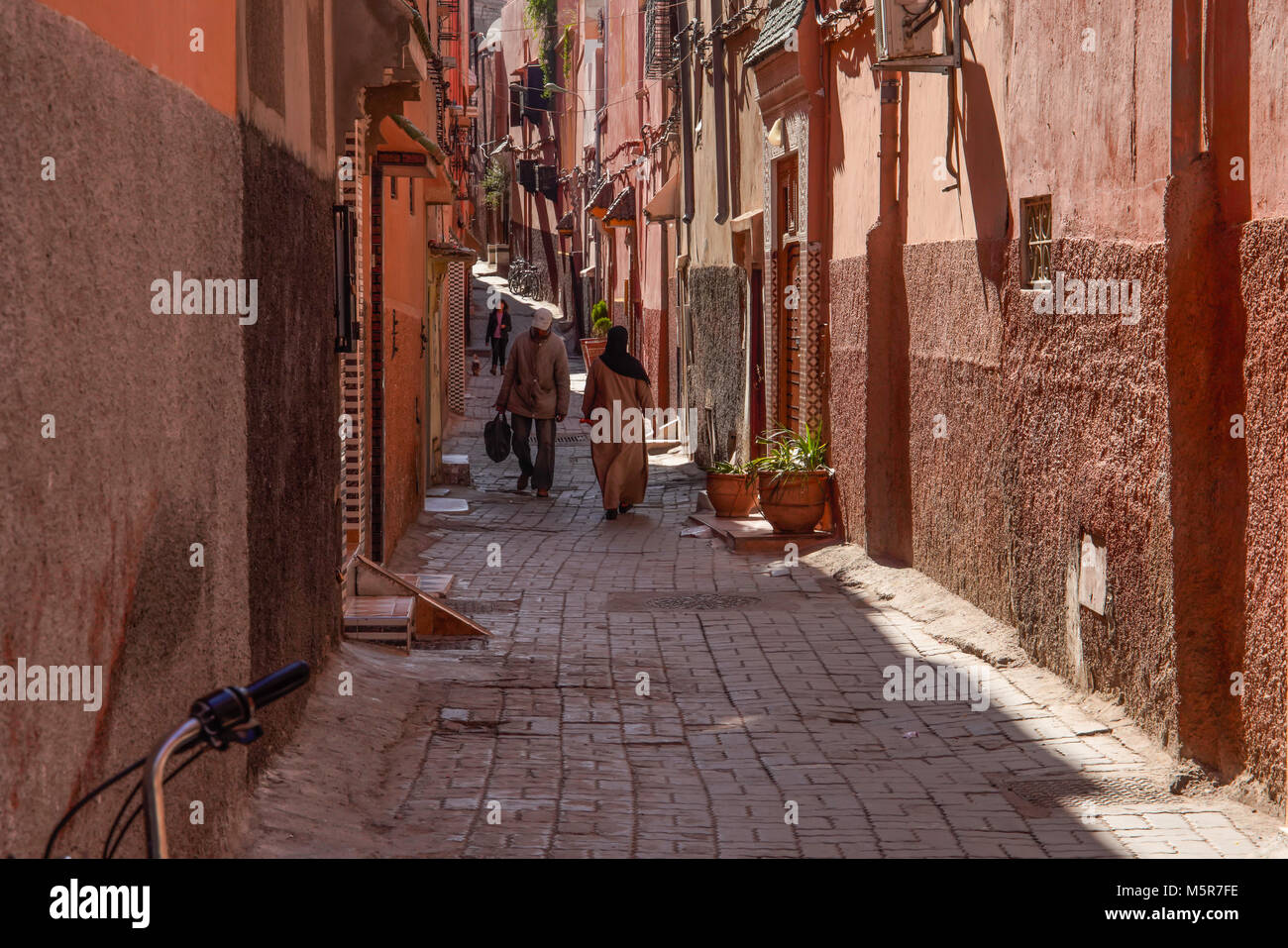 Narrow street in Marrakesh, Morocco Stock Photo - Alamy