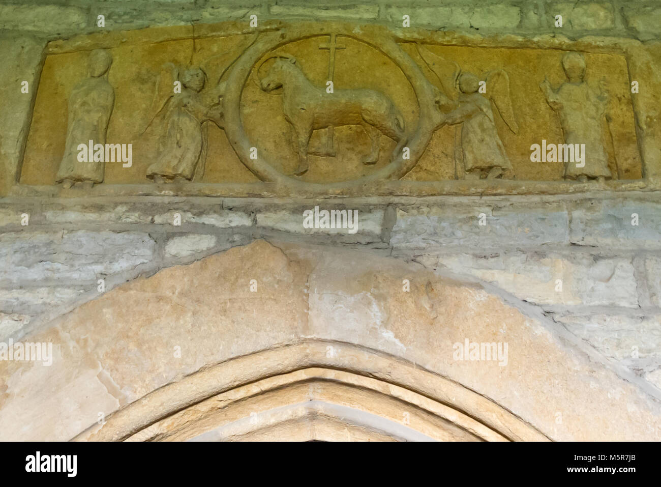 The romanesque stone carving above the southern entrance door to the ...