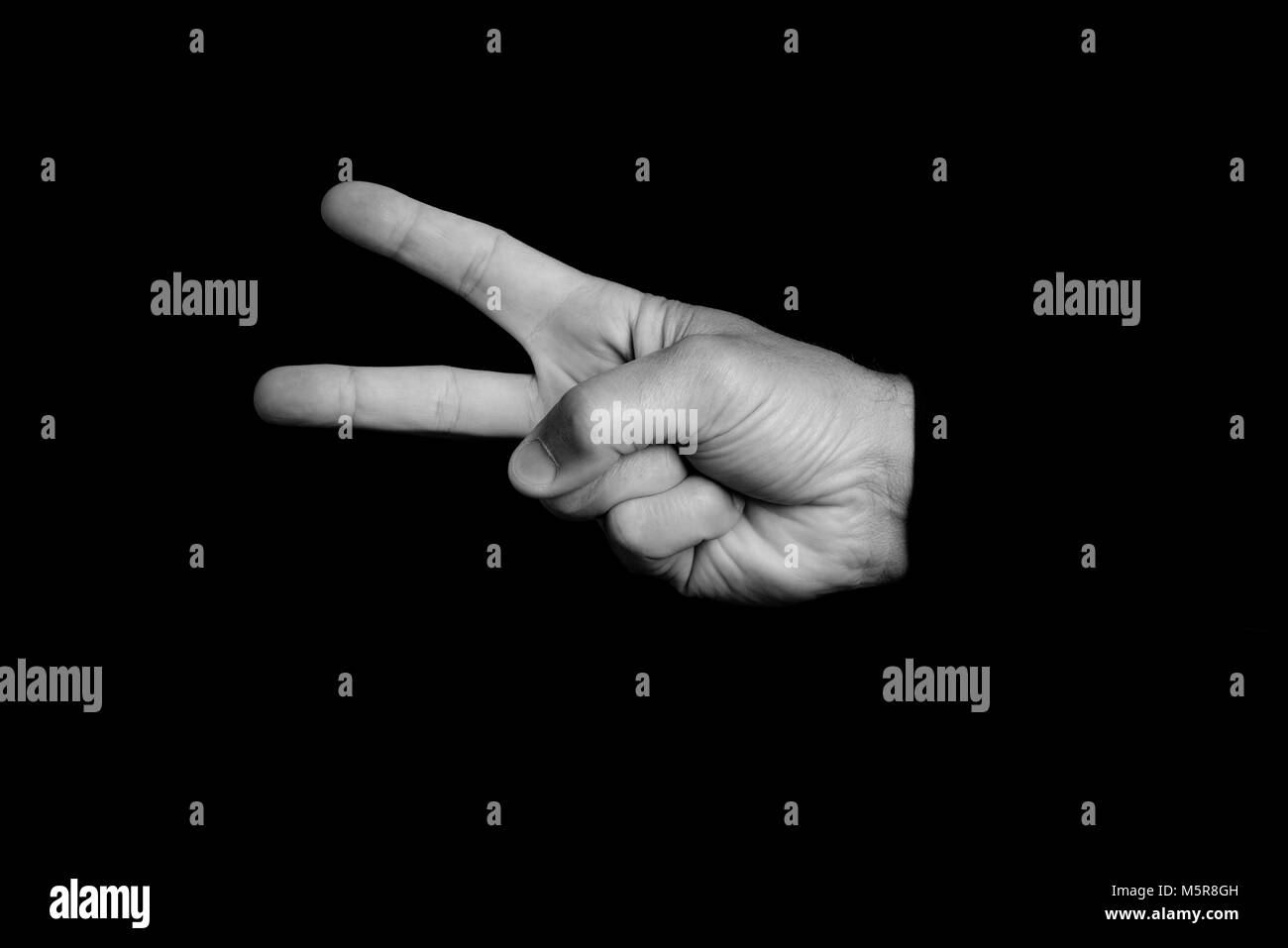 win - hand gestures on a black background - black and white photo Stock ...
