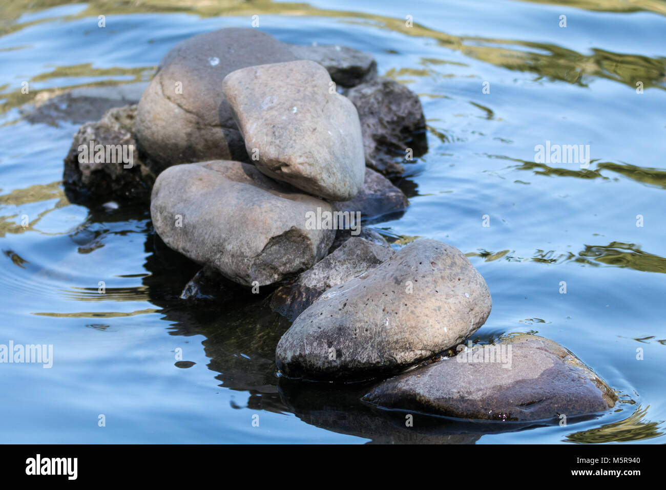 Rocks and water Stock Photo - Alamy