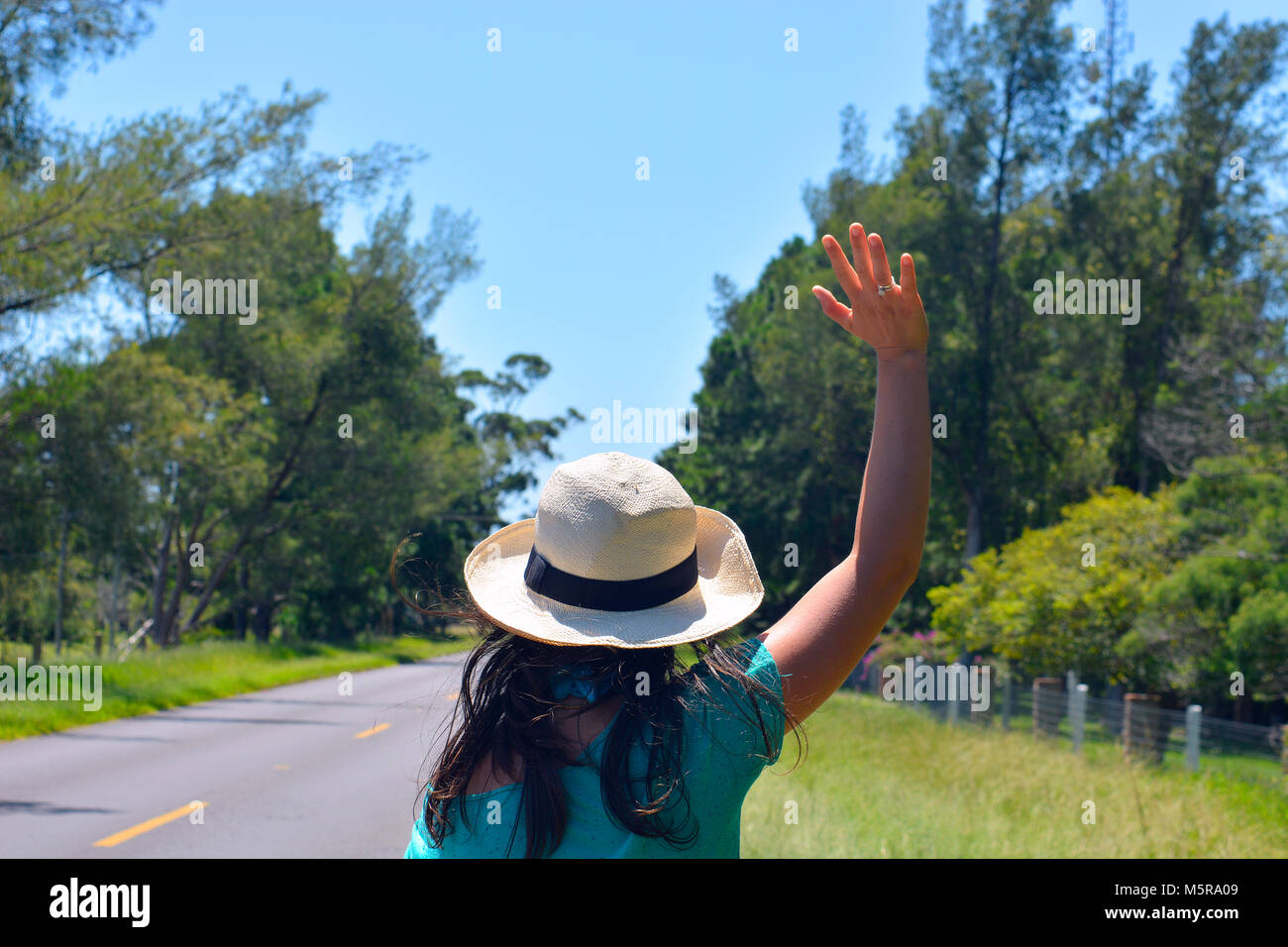 Waving goodbye hi-res stock photography and images - Alamy