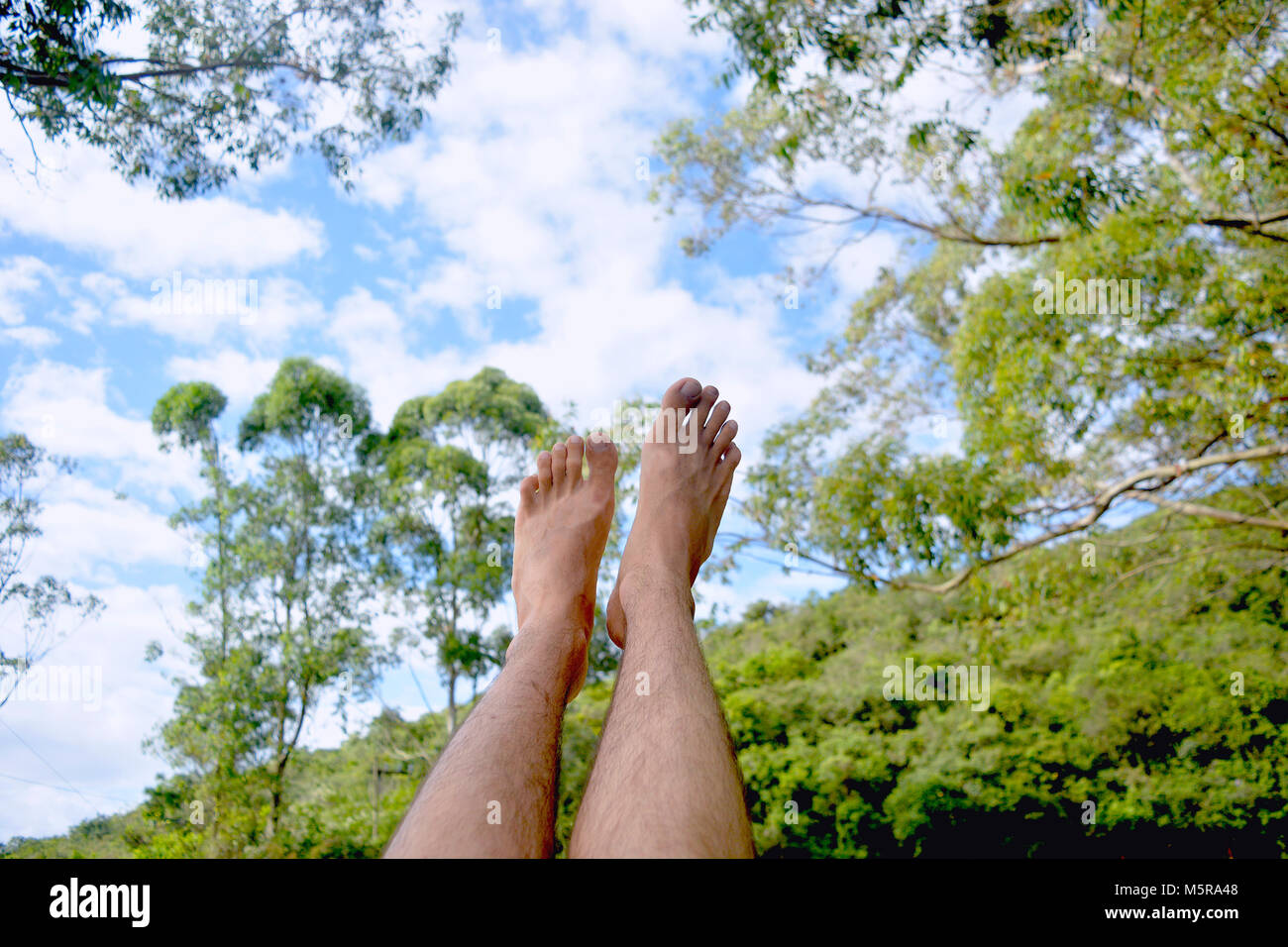 Feet up vacation Stock Photo - Alamy