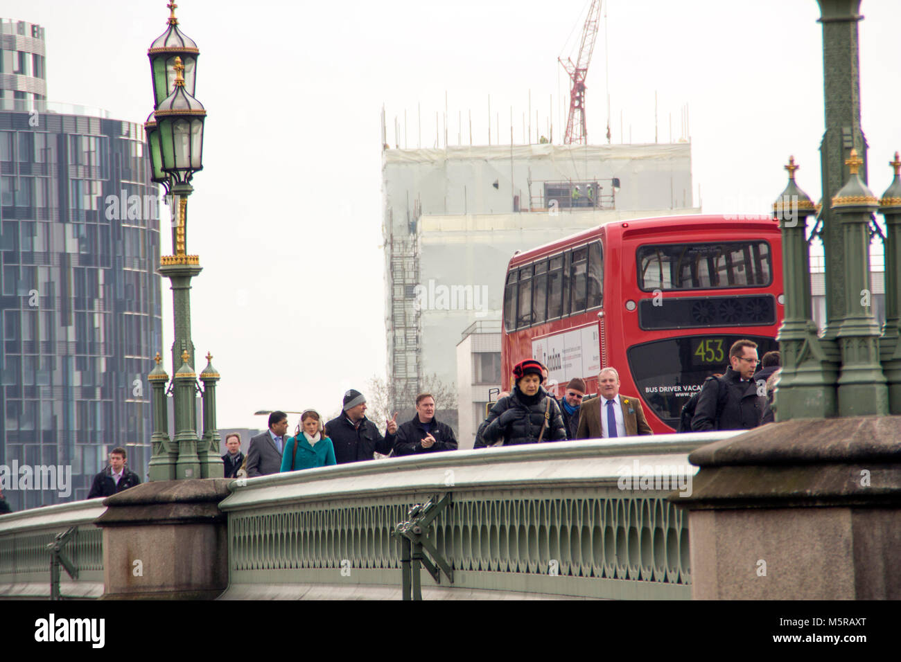 Colour Photograph of commuters walking over London Bridge. London ...
