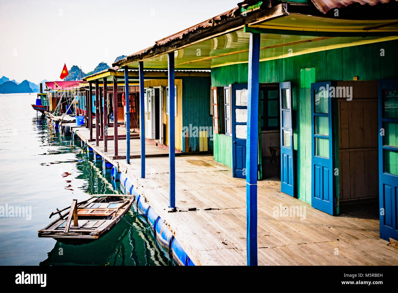 Floating houses at the Cua Van floating village, Halong Bay, Vietnam ...