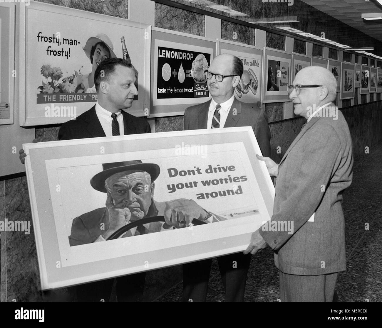 State employees display a public service message on a billboard to ...
