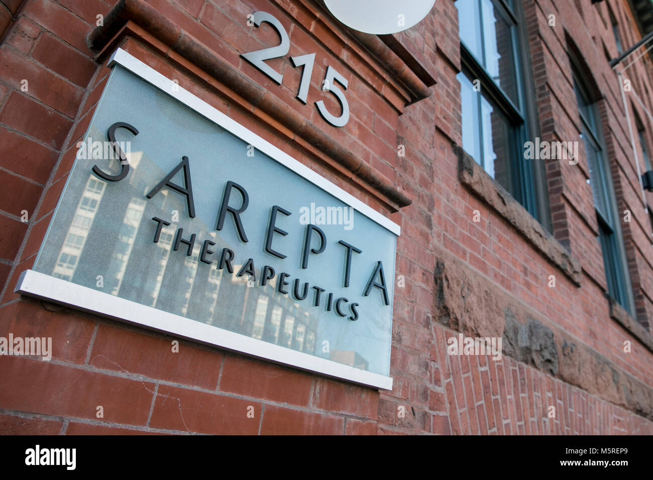 A logo sign outside of the headquarters of Sarepta Therapeutics, Inc ...