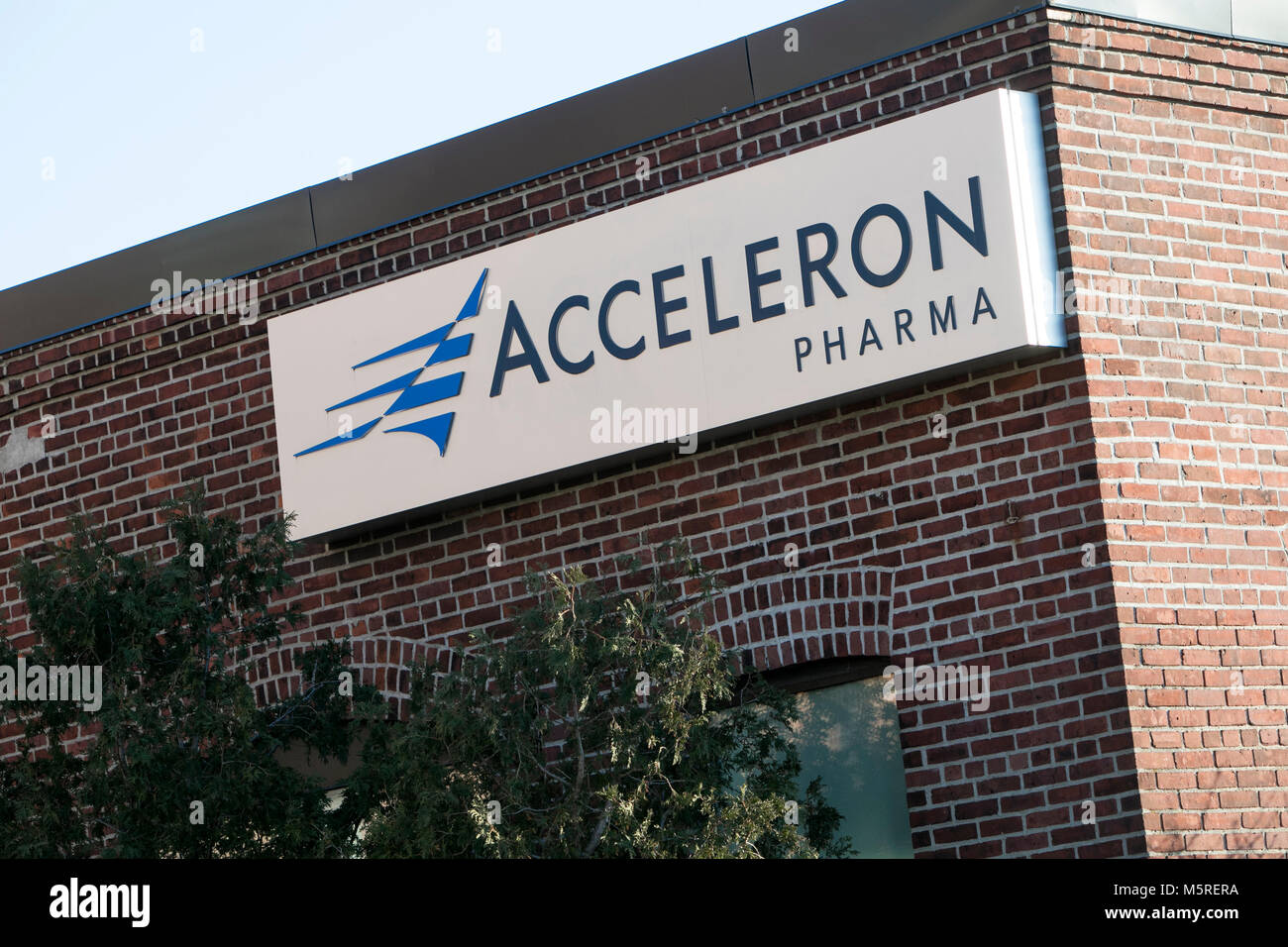 A logo sign outside of the headquarters of Acceleron Pharma, Inc., in ...