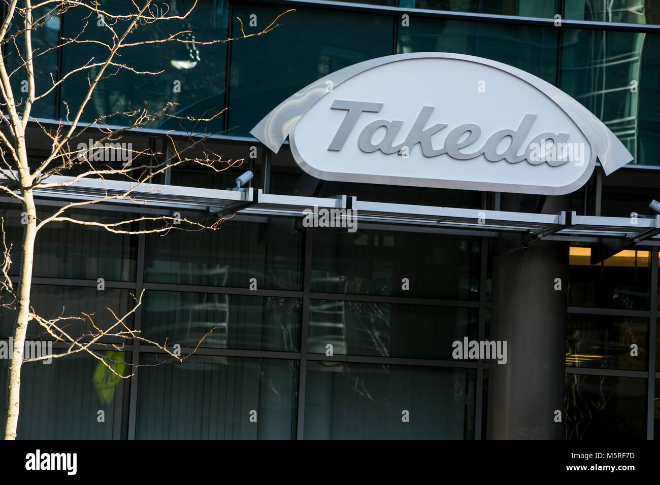 A logo sign outside of a facility occupied by Takeda Pharmaceutical ...