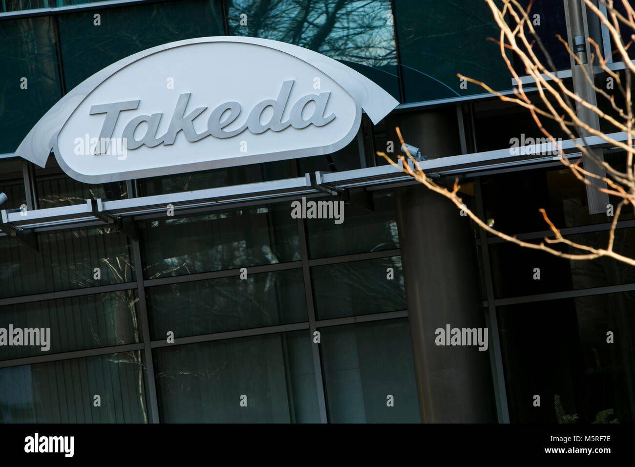A logo sign outside of a facility occupied by Takeda Pharmaceutical ...