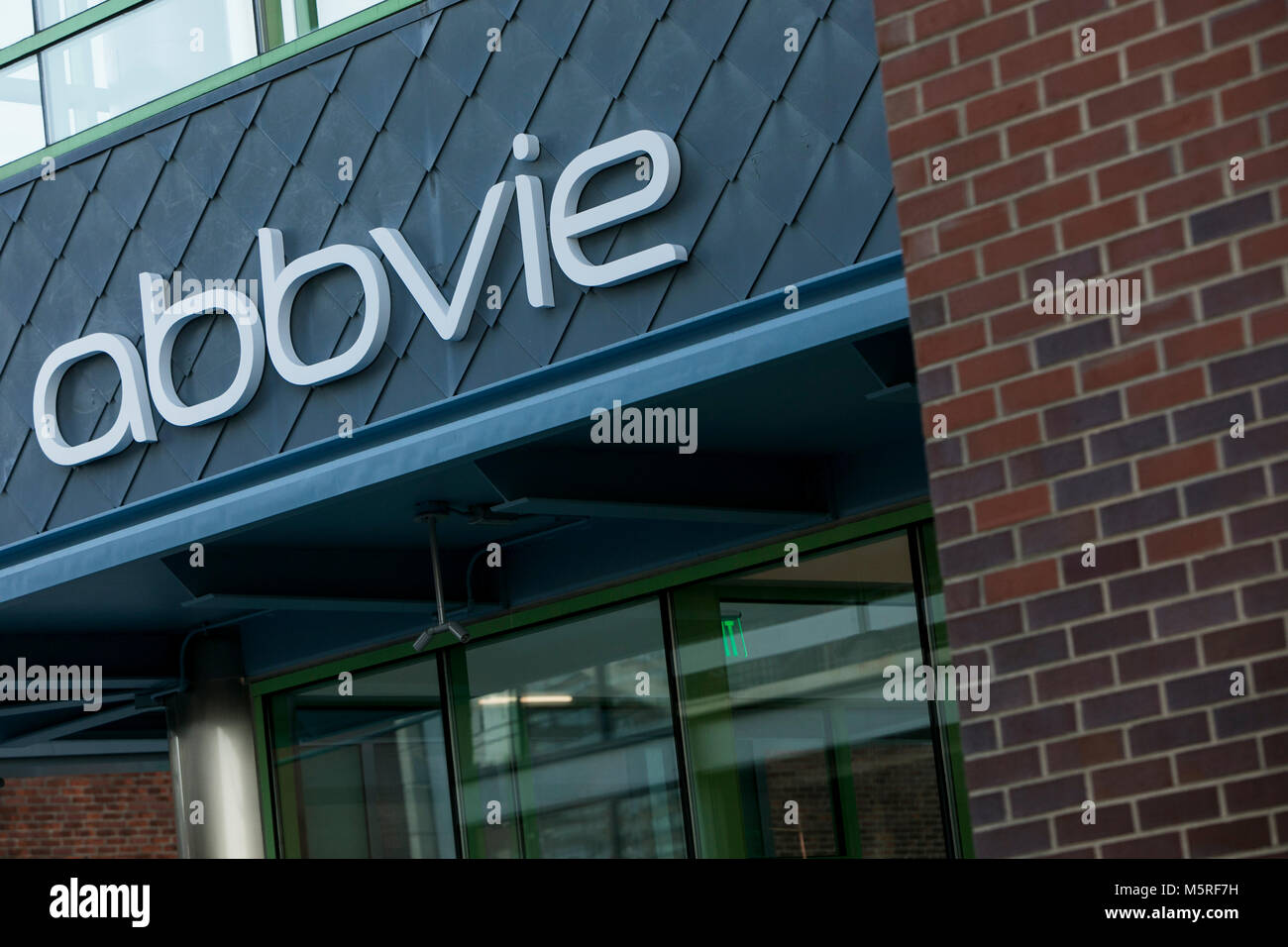 A logo sign outside of a facility occupied by AbbVie, Inc., in ...