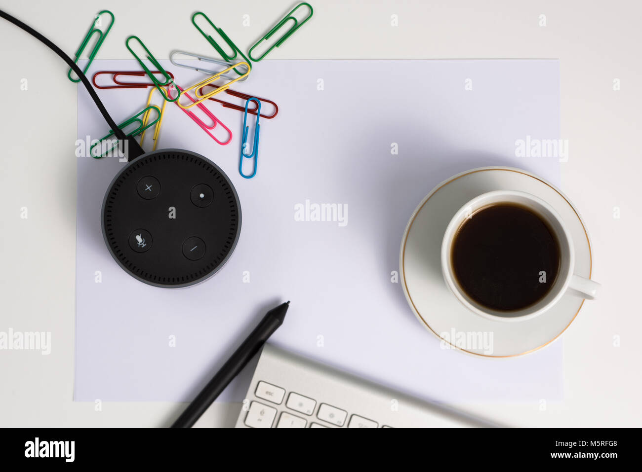 Office work desk and Amazon Alexa artificial intelligence device Stock ...