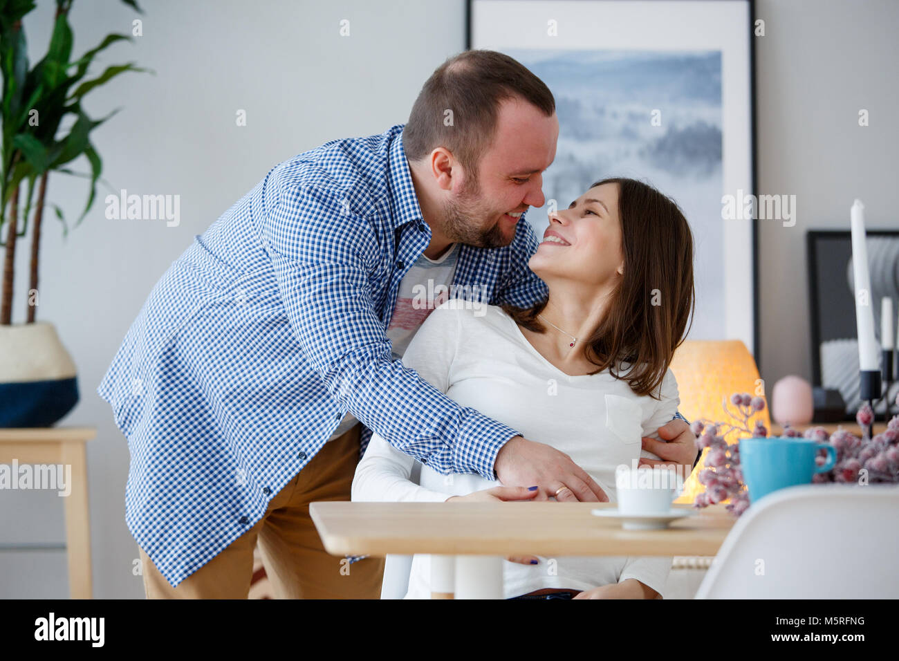 Picture of happy hugging couple Stock Photo - Alamy