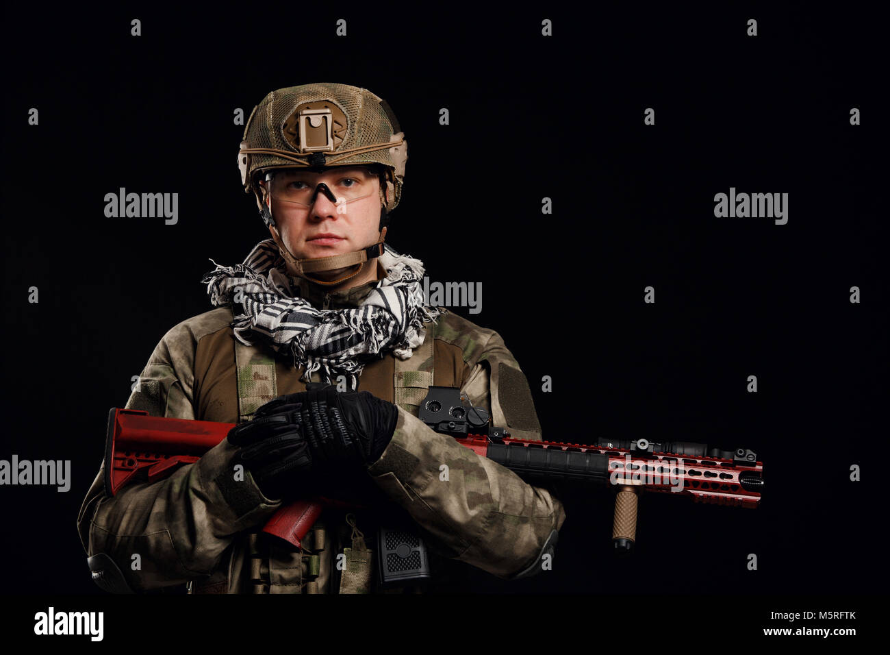 Photo of soldier in helmet with gun Stock Photo - Alamy
