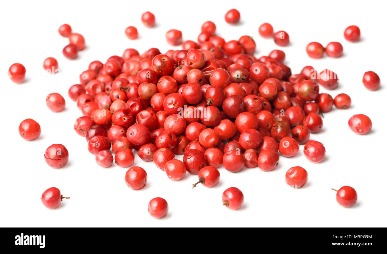 dried pink peppers isolated on white background Stock Photo - Alamy