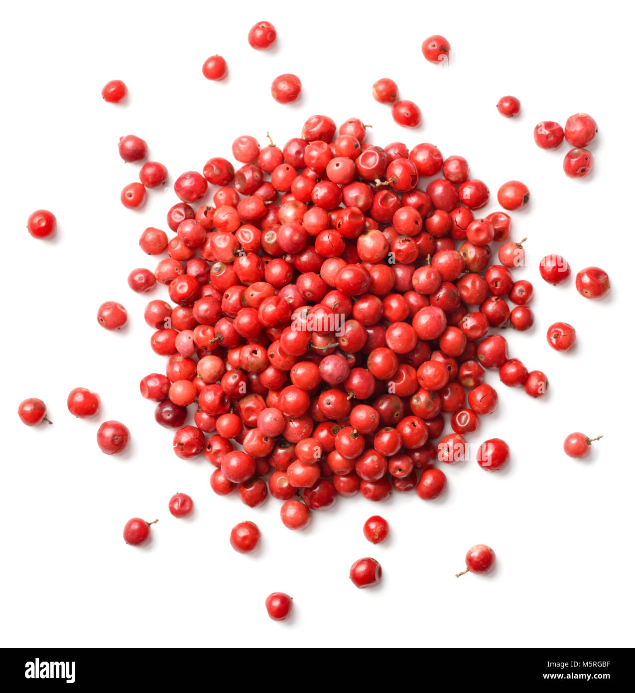 dried pink peppers isolated on white background Stock Photo - Alamy