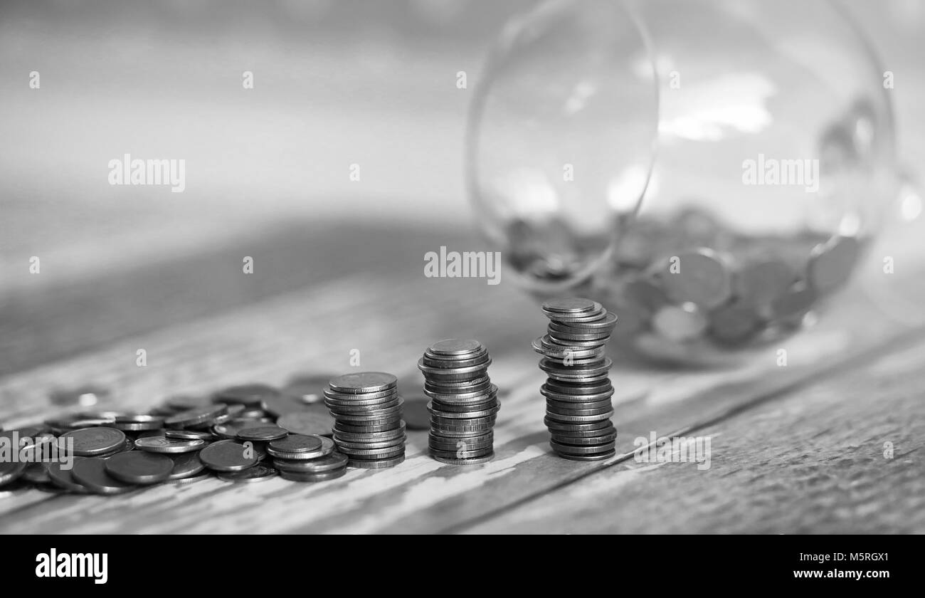 Wooden box coins in Black and White Stock Photos & Images - Alamy