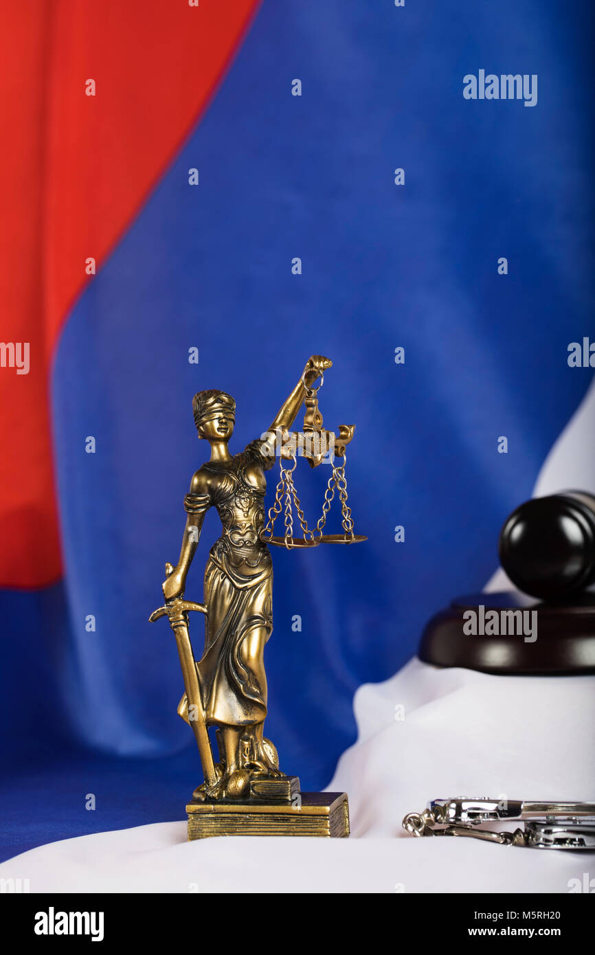 Statue of Themis on a flag of Russian Federation. Closeup Stock Photo ...