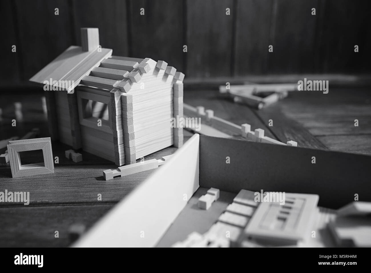 Toy wooden house. The constructor is made of natural wood for ch Stock ...