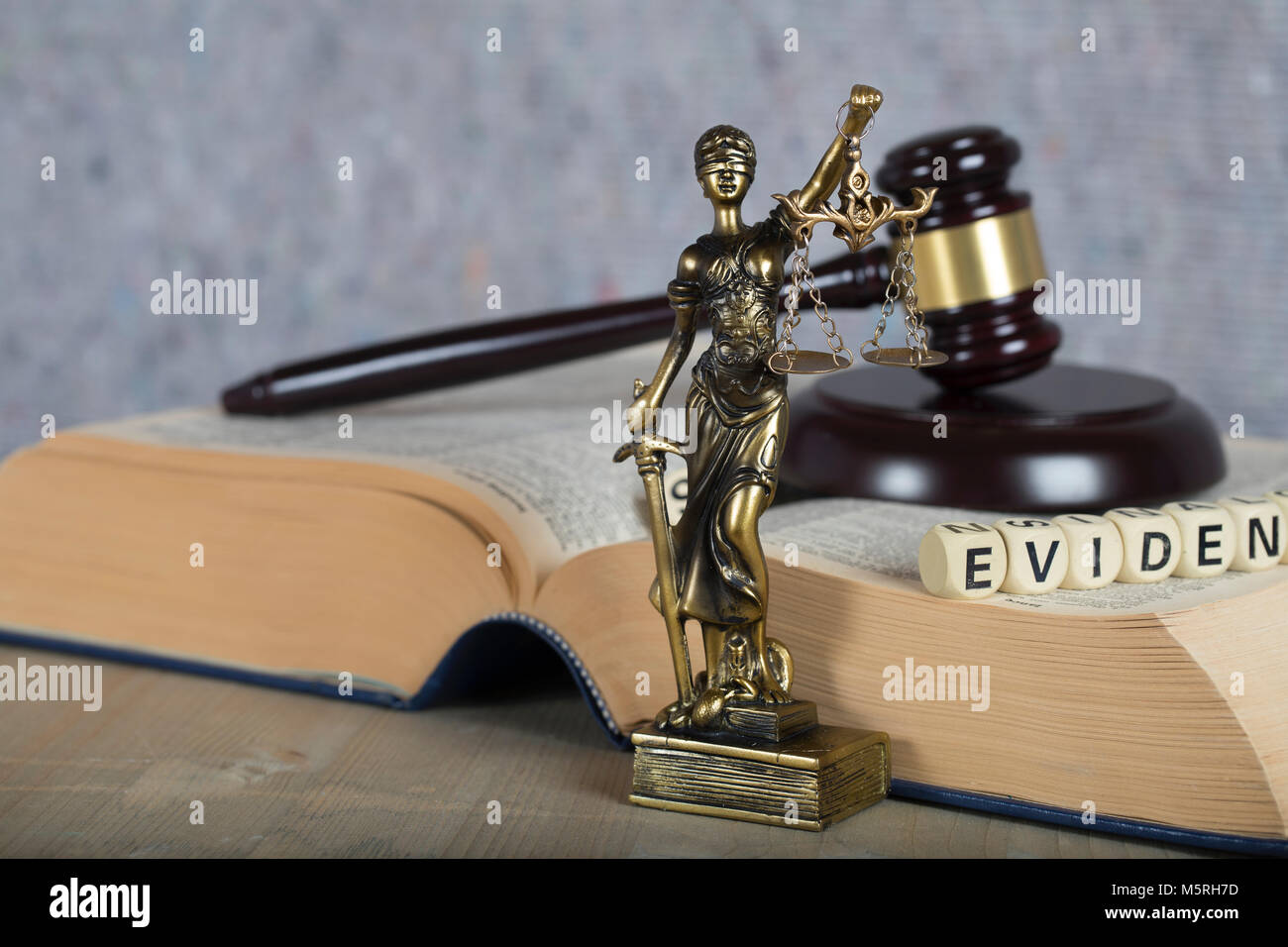 Statue of ancient Greek Titaness- Themis. Judge's gavel in the ...