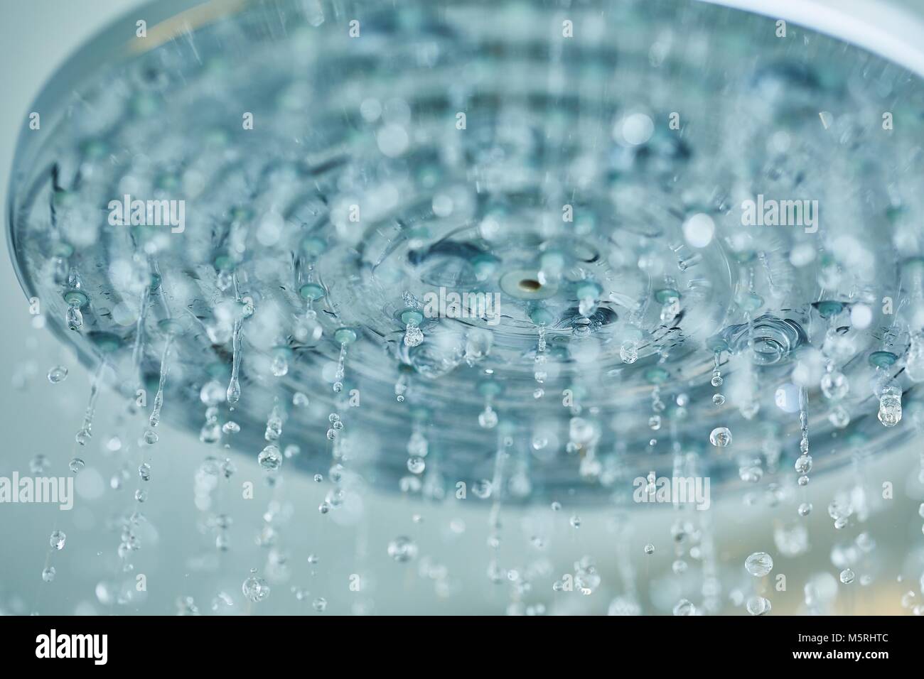 Shower water flowing Stock Photo - Alamy
