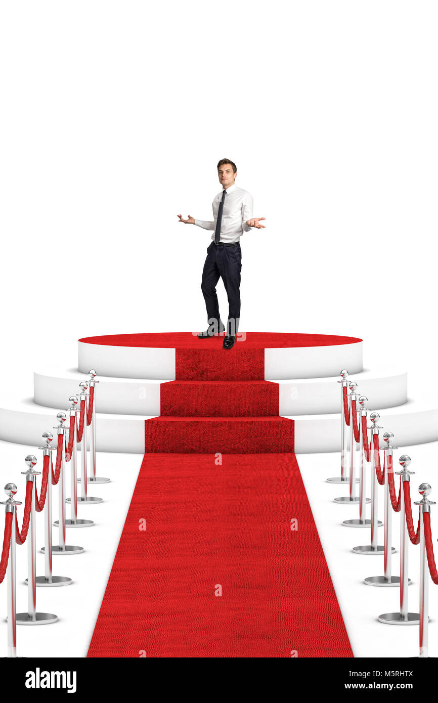 man on podium and red carpet with rope barrier Stock Photo - Alamy