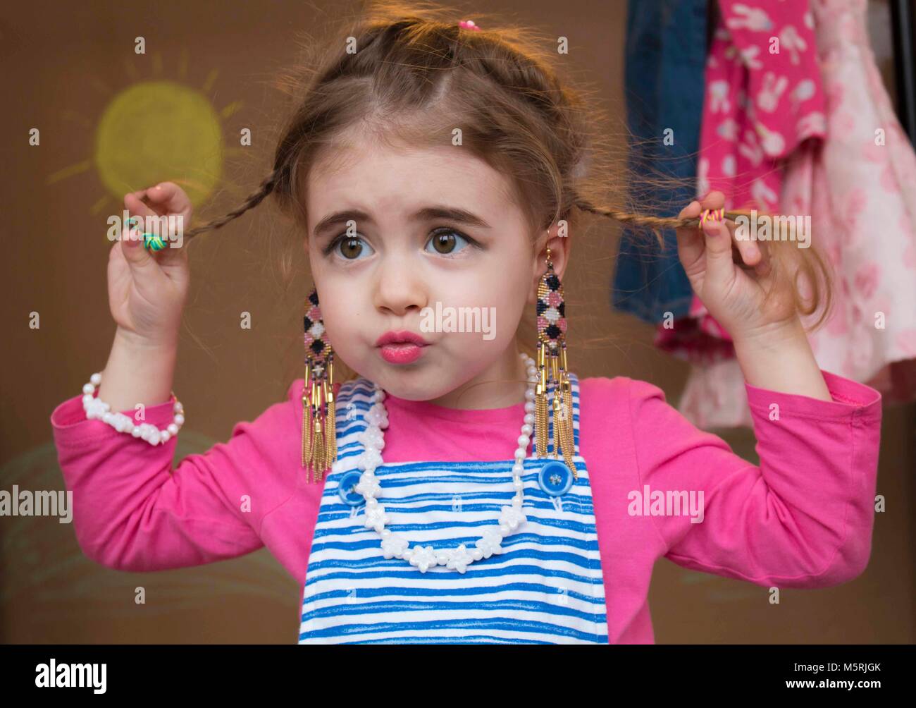 Cunning smile hi-res stock photography and images - Alamy
