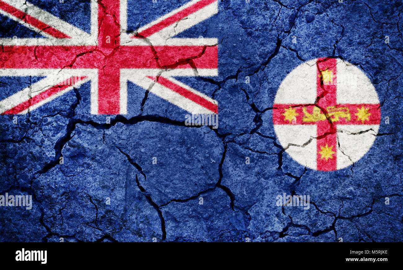 New South Wales flag on dry earth ground texture background Stock Photo ...